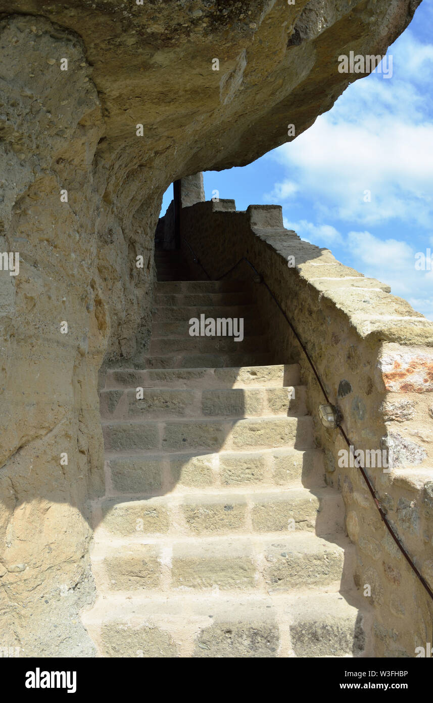 Carved stairs on the rock that leads to Monastery of Holy Trinity in ...