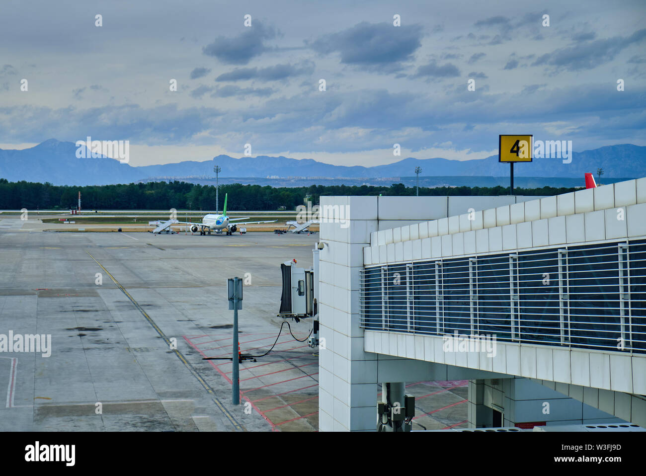 Gate number 4 at airport sitting empty, with no plane and parked ...