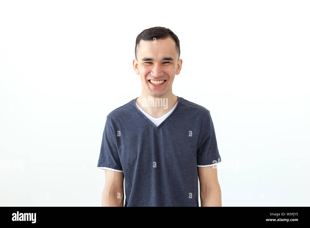 Expression and gesture concept - Close up portrait of laughing asian ...