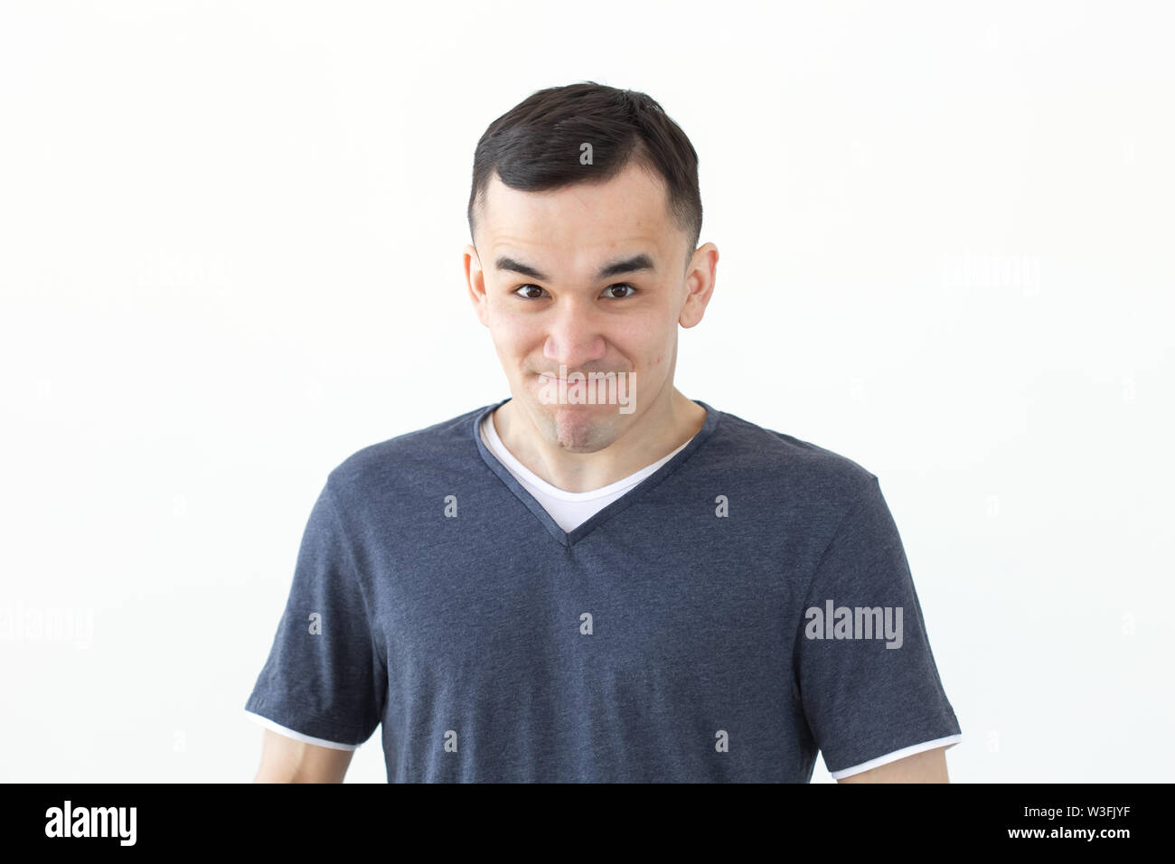 Expression and gesture concept - Portrait of angry man on white ...