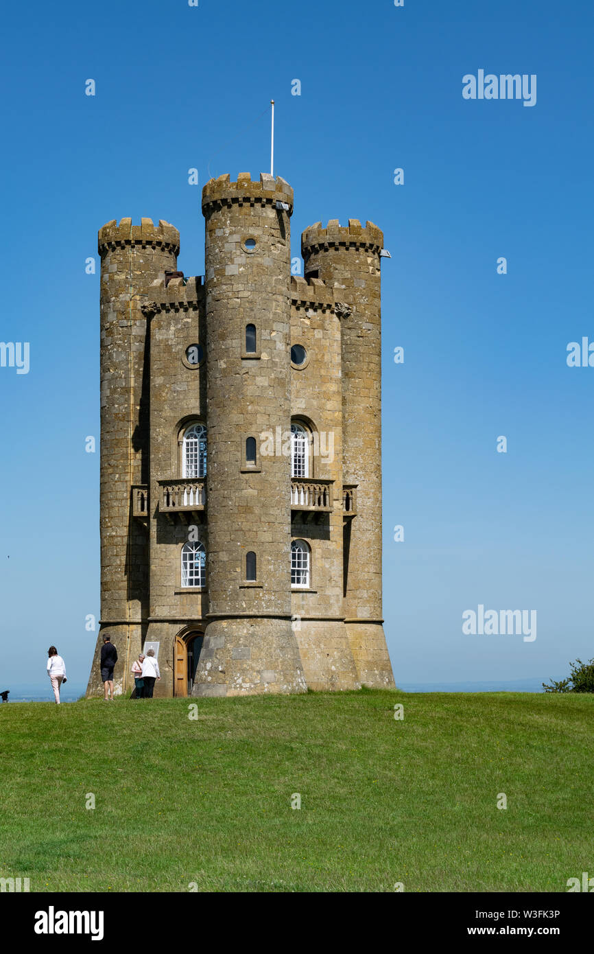 Visitors enjoying the summer sunshine at Broadway Tower in the ...
