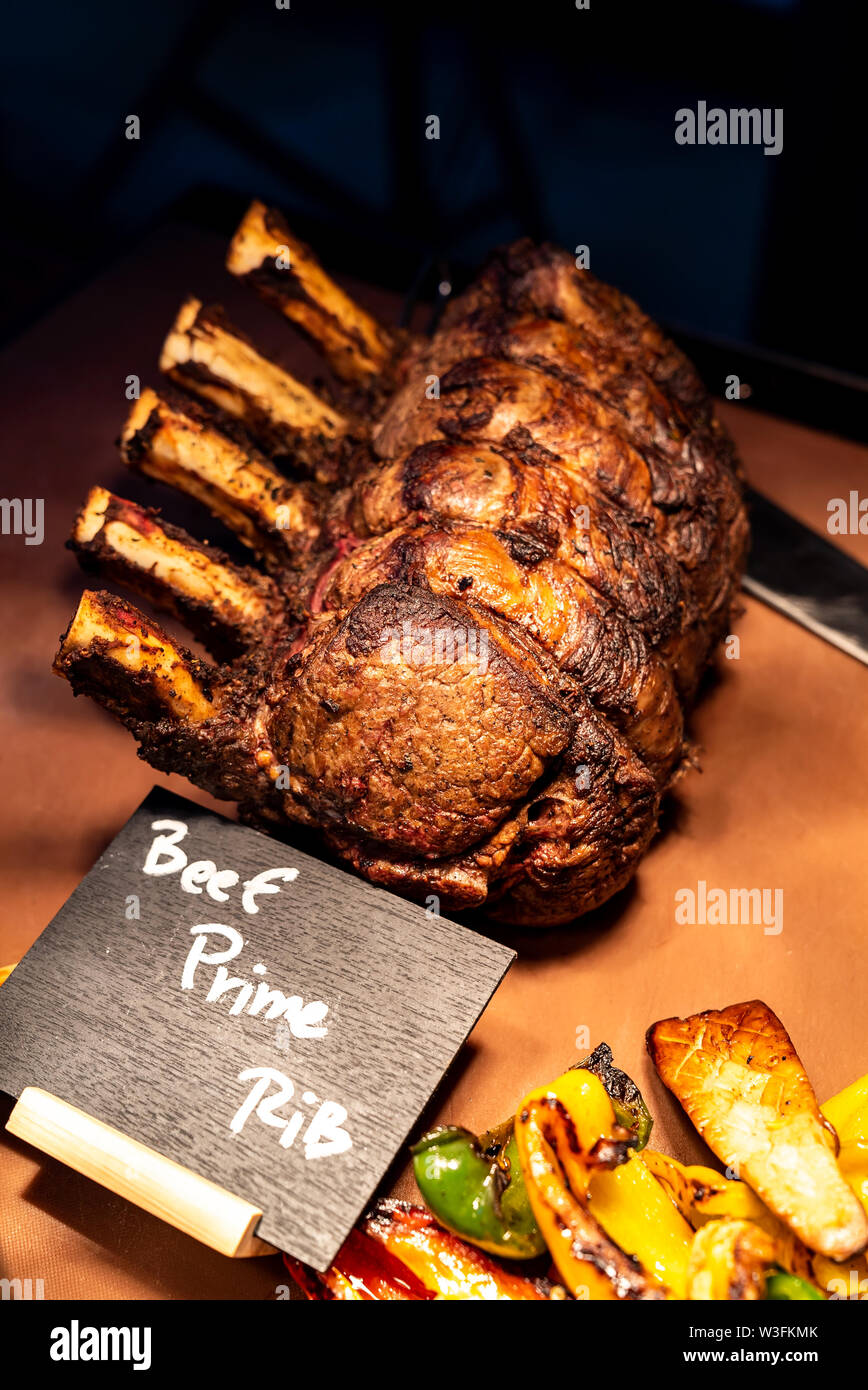 Wagyu beef roast prime rib, Carving food Stock Photo - Alamy