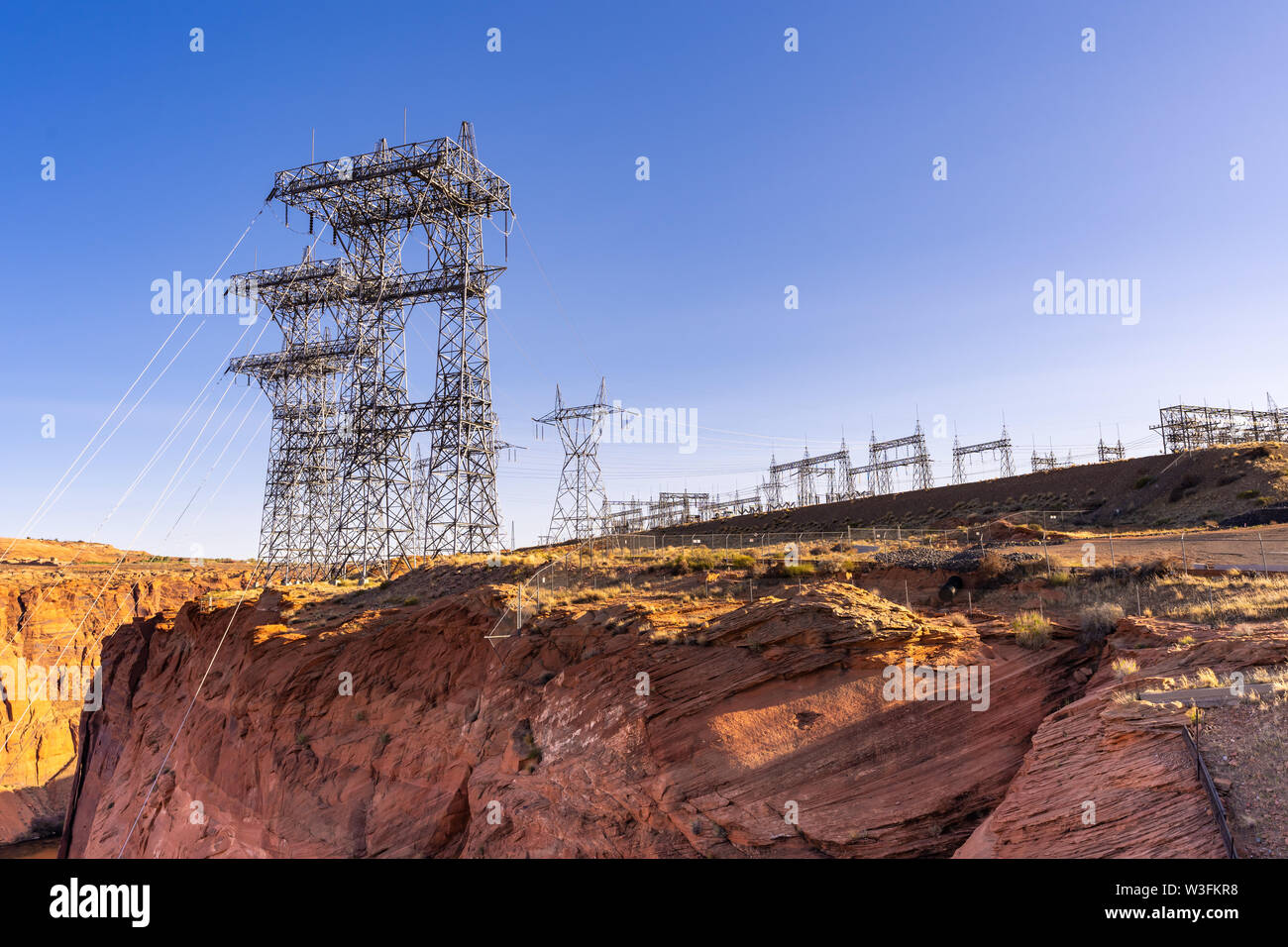 Power plant house and power line over Electricity generating dam in ...