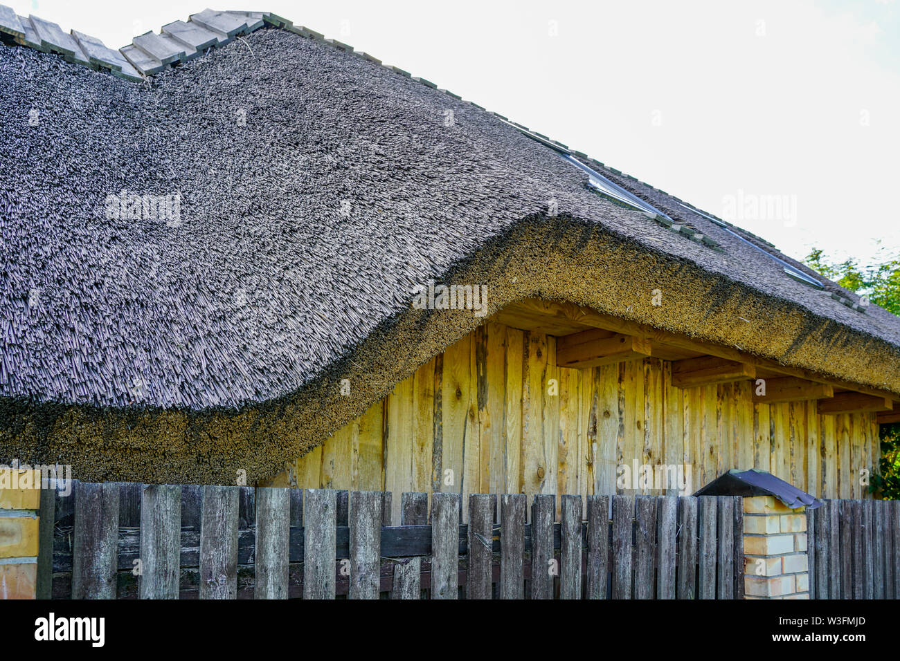 traditional old fishermans wooden house with reed roof Stock Photo - Alamy
