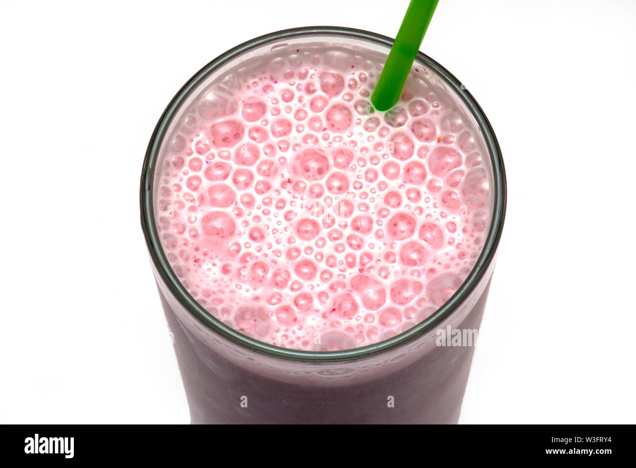 Top view of Glass with Strawberry Milkshake isolated on white ...