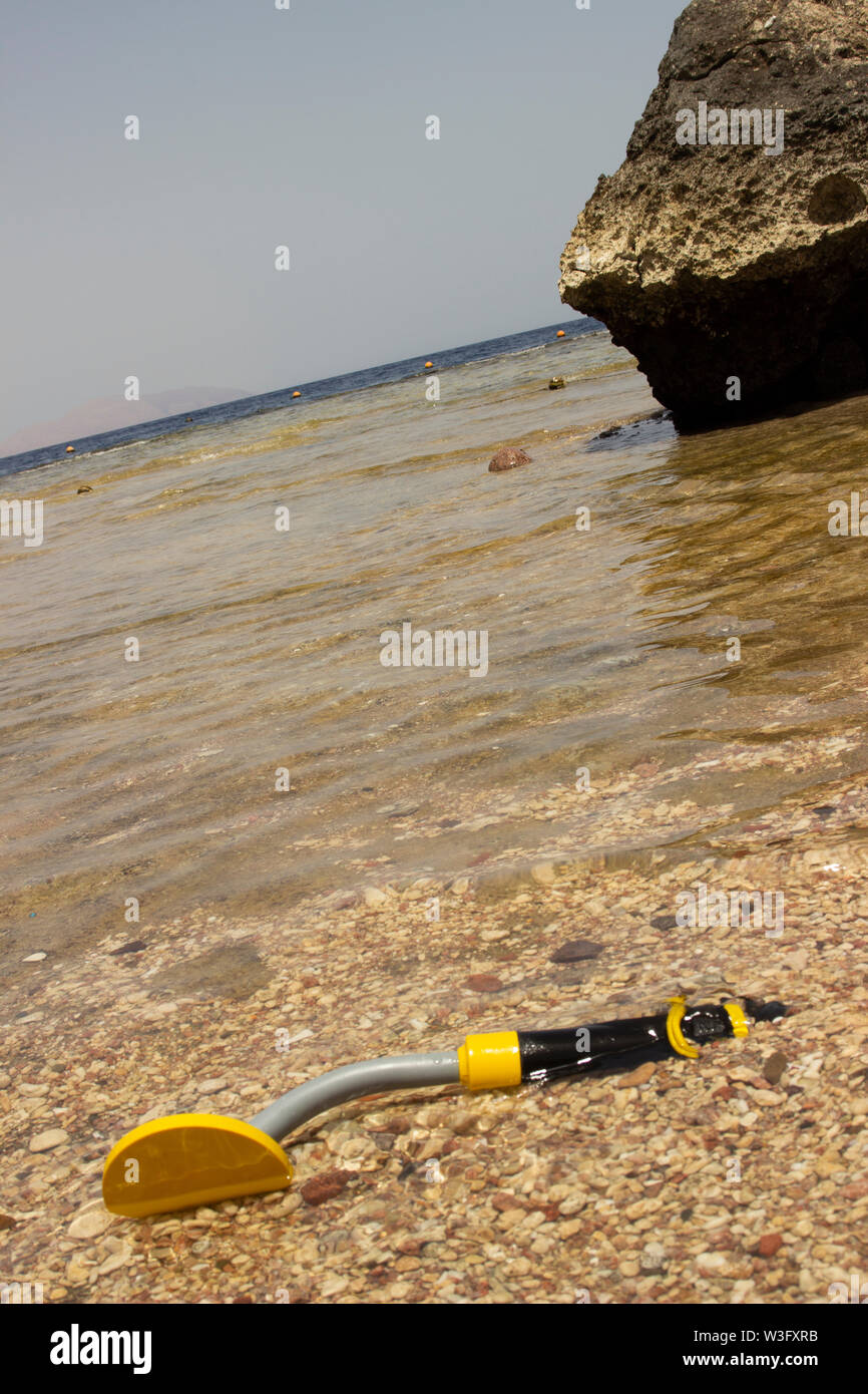 The photo of gold and silver coins collected with help of underwater ...