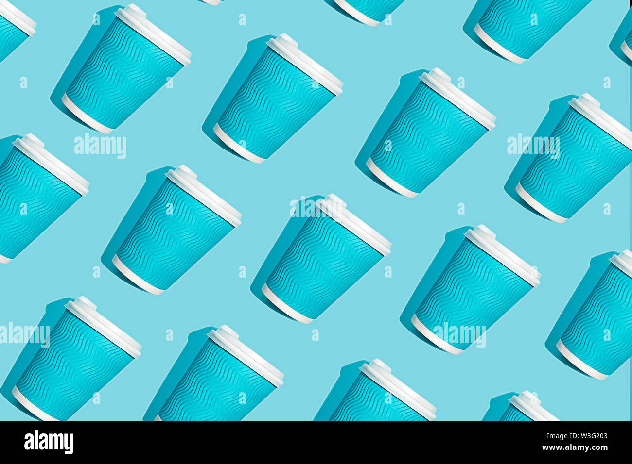 Coffee pattern of blue paper cup for coffee on bright blue background ...