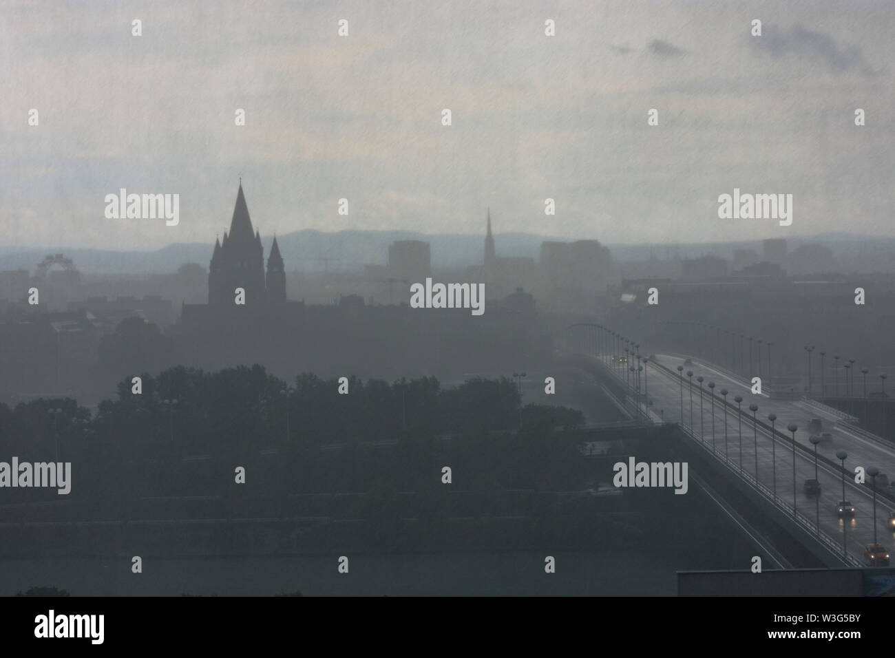 Wien, Vienna: heavy rain over Vienna city center, river Danube, bridge ...