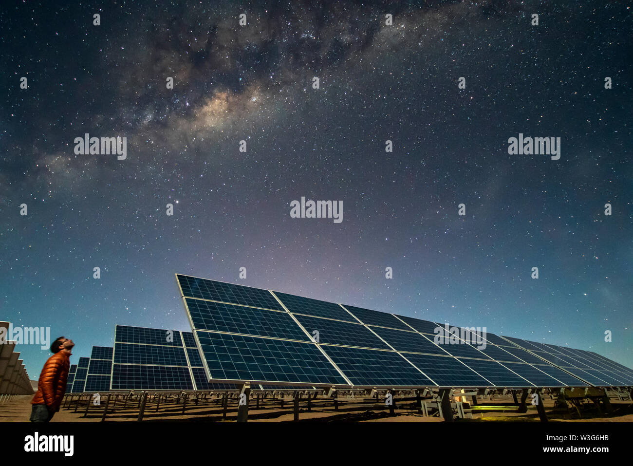 One man looking at views in a Solar Energy Farm at Atacama Desert arid ...