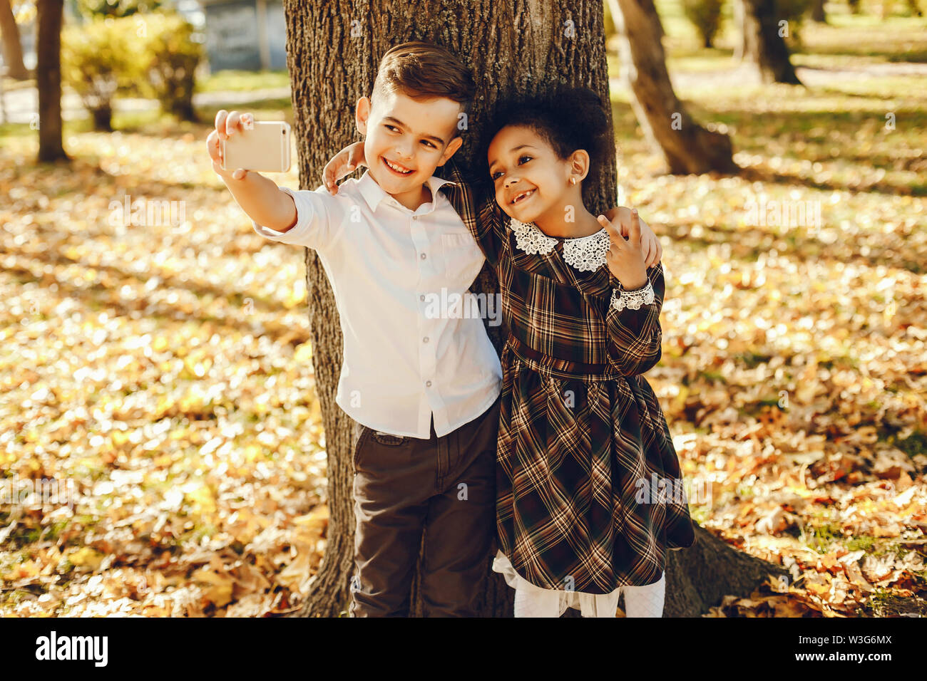 children in a park Stock Photo - Alamy