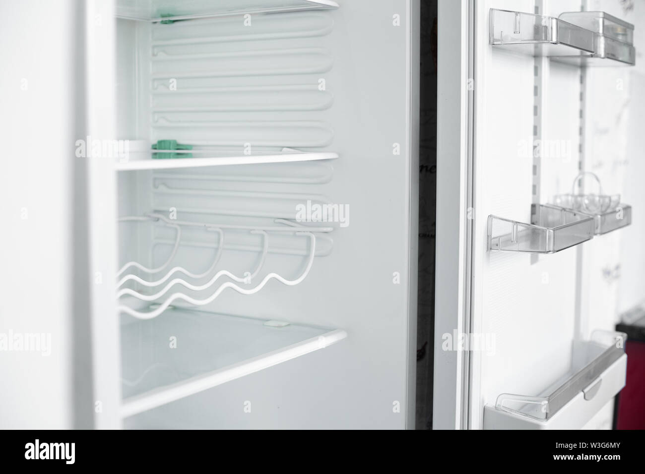 Front view of empty refrigerator staying at home Stock Photo - Alamy