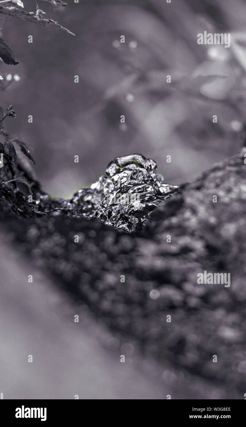 Fully edited photo of a splash of water coming down a stream! Stock ...