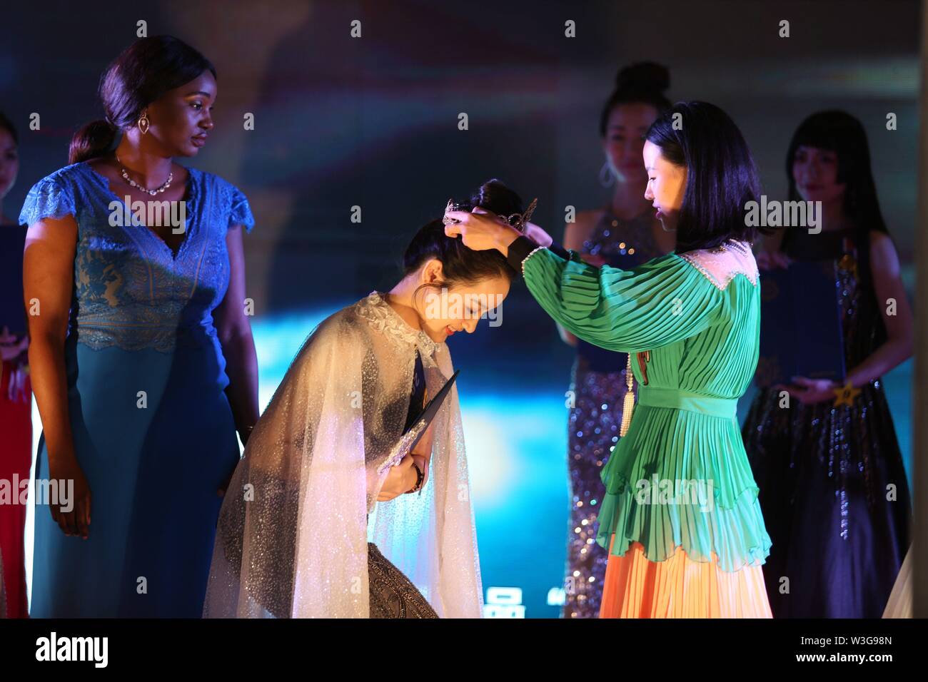 New York, USA. 14th July, 2019. Liu Hanna (C), champion of the 2019 ...