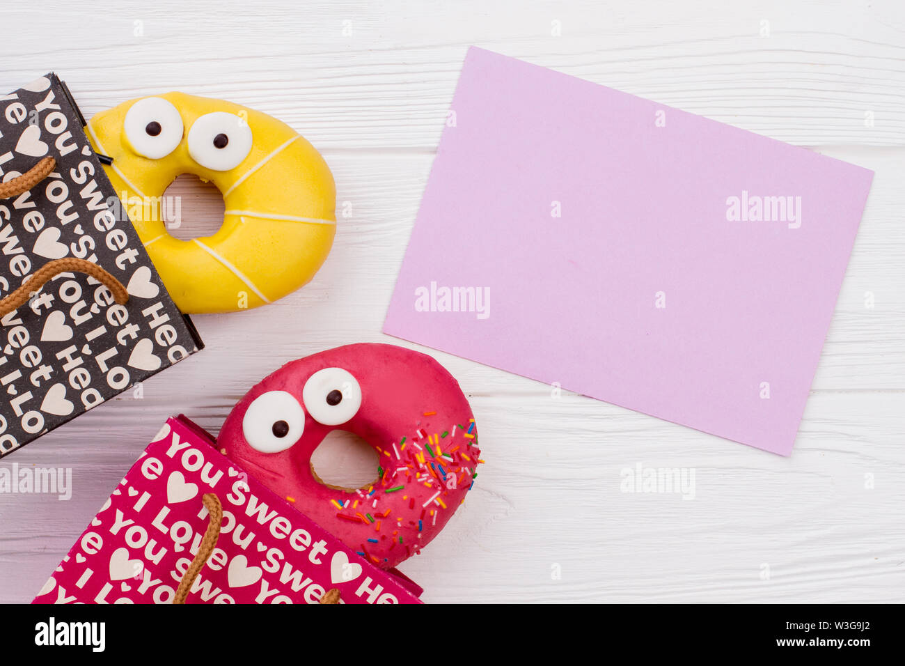 Glazed donuts in paper hi-res stock photography and images - Alamy