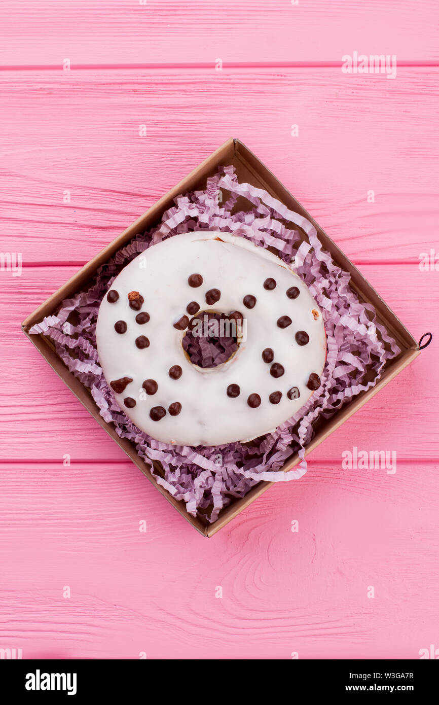 Gift box with donut, top view Stock Photo - Alamy