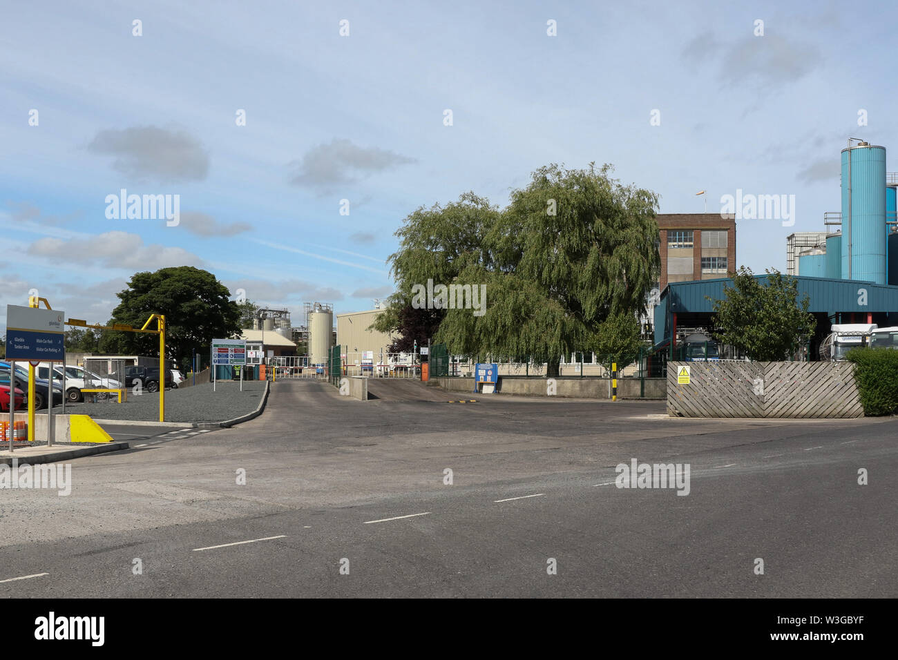 Car park and main entrance to the Glanbia cheese processing plant at ...