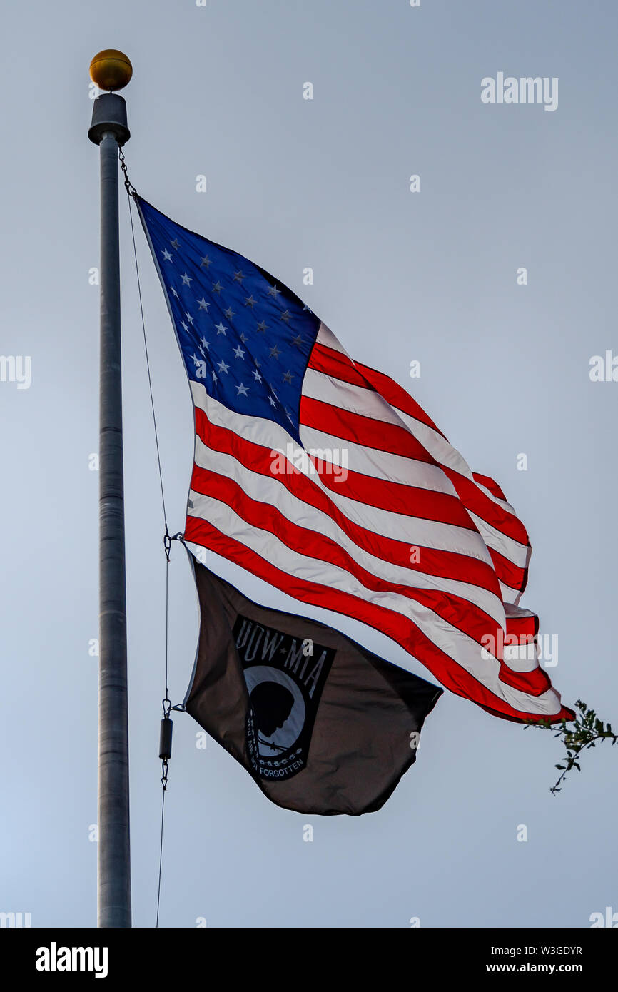 American Flag and POW flag waving in the breeze Stock Photo - Alamy