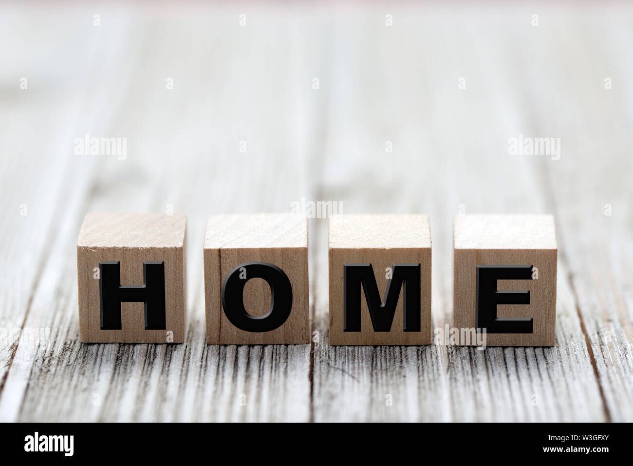 Alphabet letter word home on wood background Stock Photo - Alamy