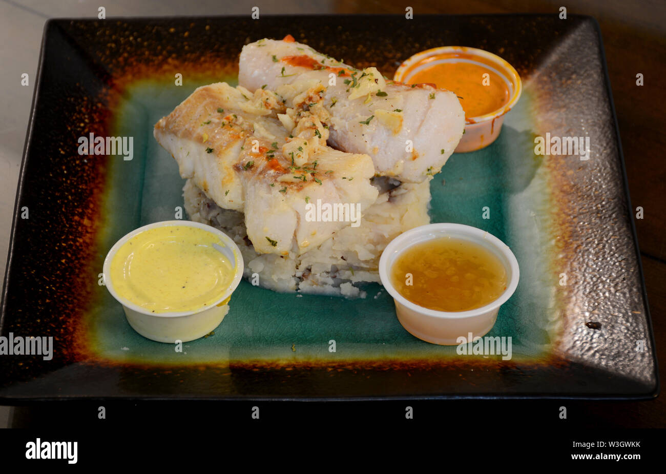 Traditional Cuban plate of Cod and Batata Stock Photo - Alamy