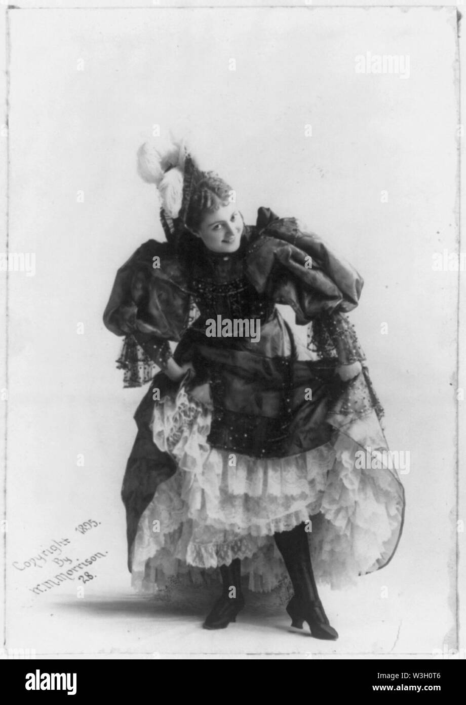 Cissy Fitzgerald, full length, standing, curtsying, facing right ...