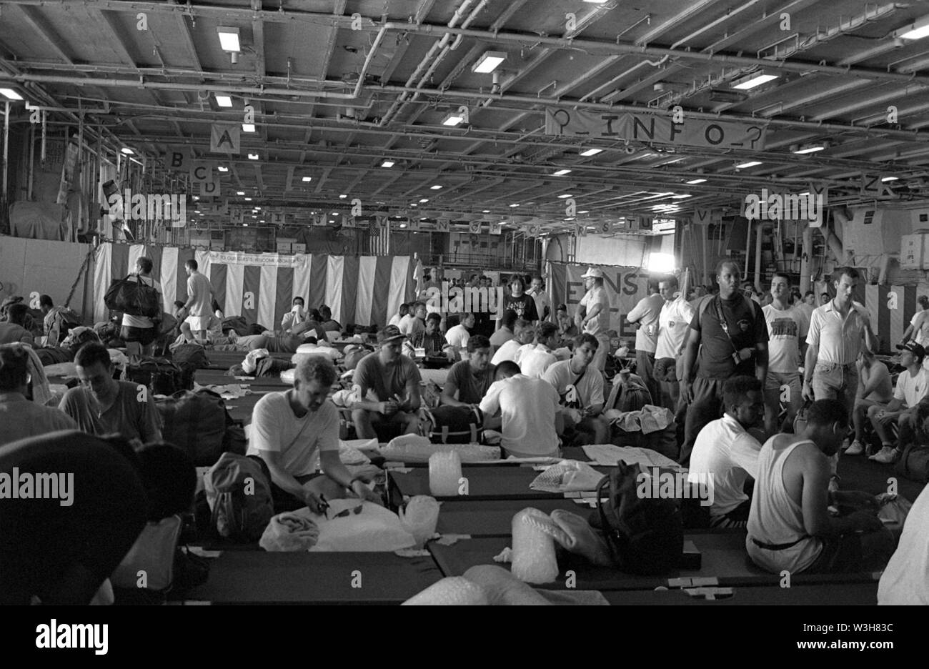 Clark Air Base and Subic Bay refugees aboard USS Midway (CV-41), June ...