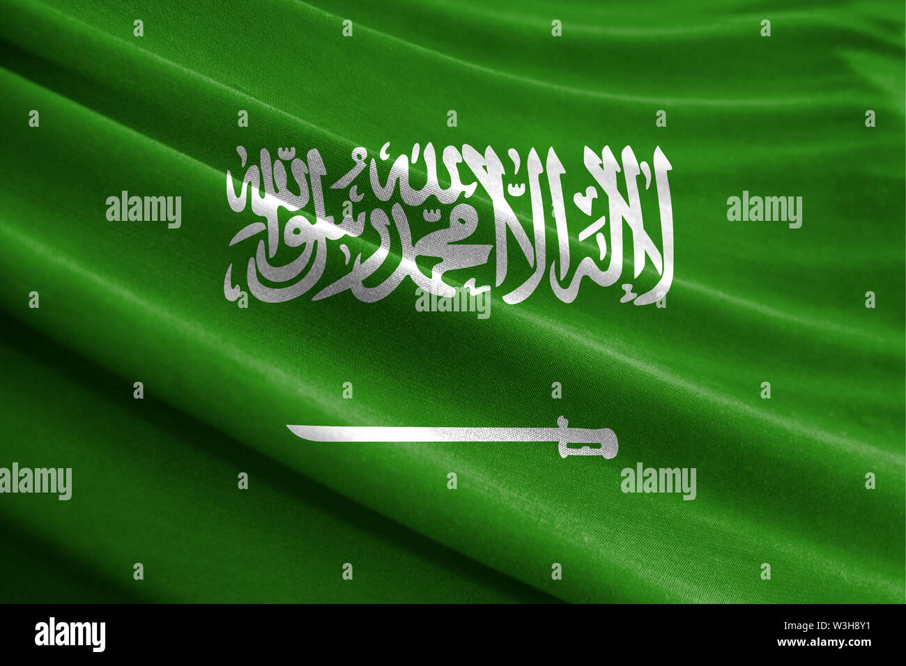 Realistic flag of Saudi Arabia on the wavy surface of fabric Stock ...