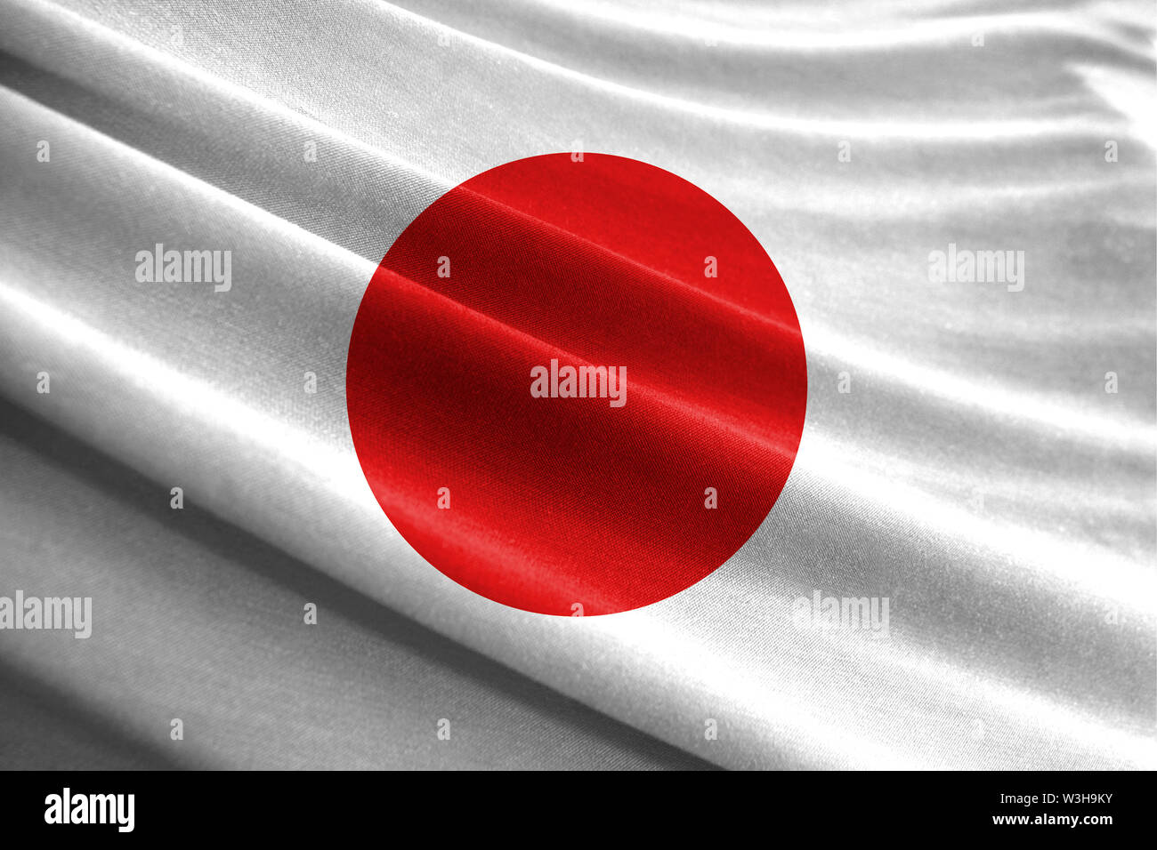 Realistic flag of Japan on the wavy surface of fabric Stock Photo - Alamy