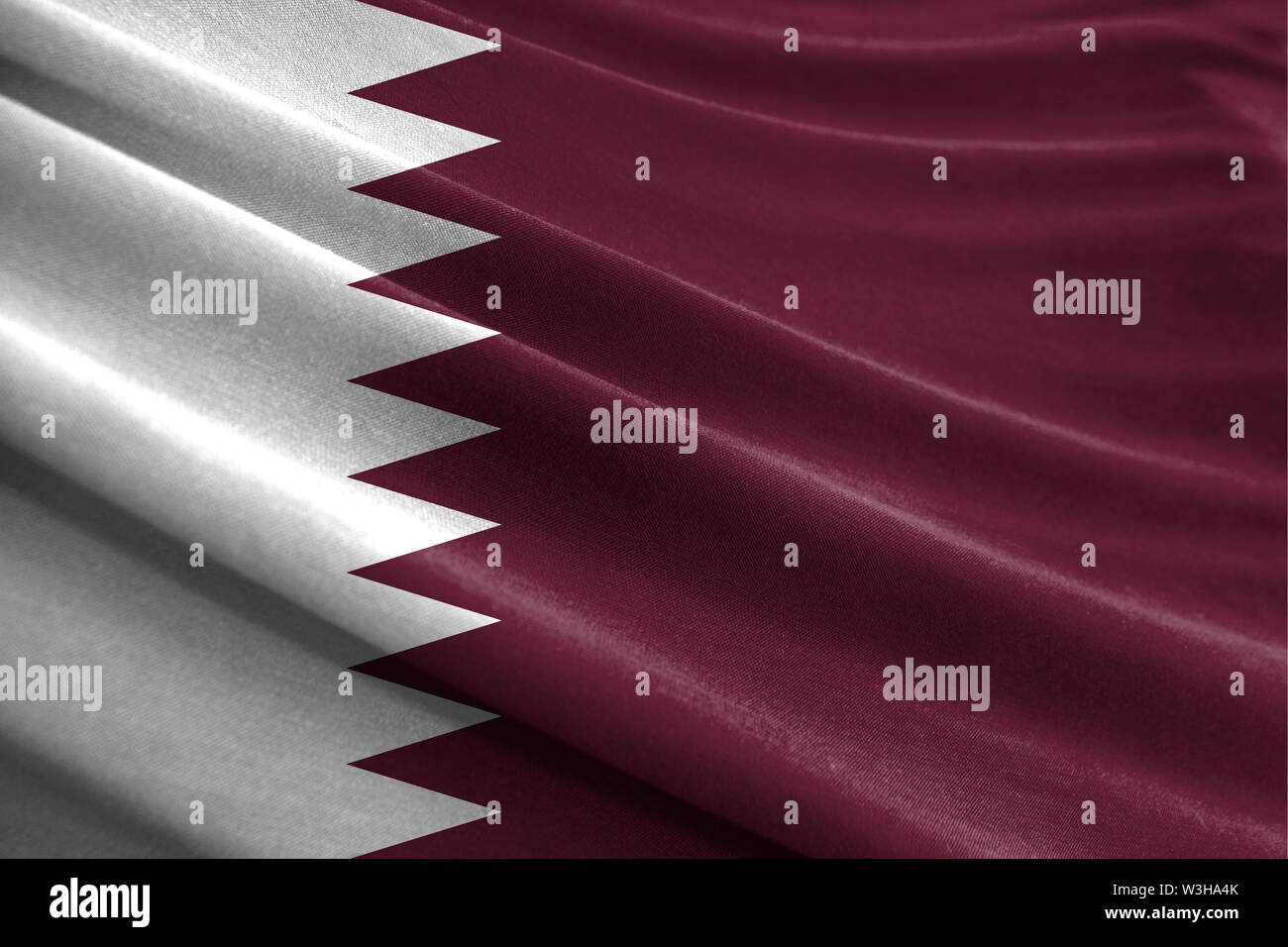 Realistic flag of Qatar on the wavy surface of fabric Stock Photo - Alamy