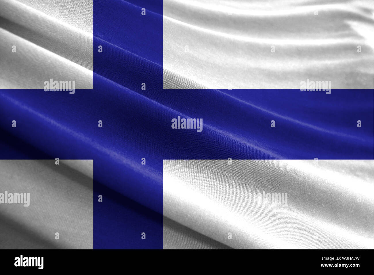 Realistic flag of Finland on the wavy surface of fabric Stock Photo - Alamy