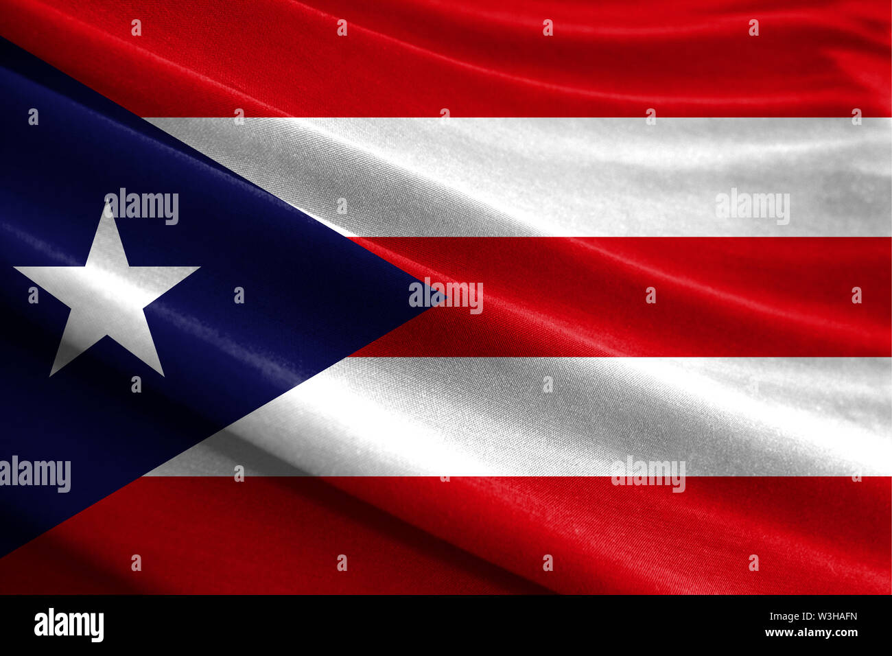 Realistic flag of Puerto Rico on the wavy surface of fabric Stock Photo ...
