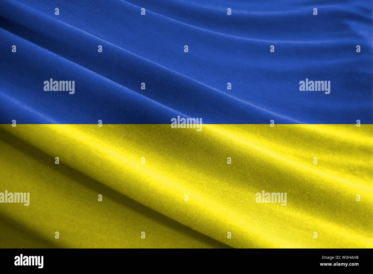 Realistic flag of Ukraine on the wavy surface of fabric Stock Photo - Alamy