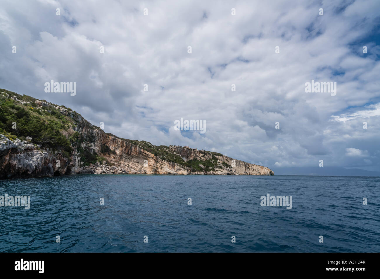 Coastline cliffs near Blue Caves as seen from a tourist boat, Zante ...