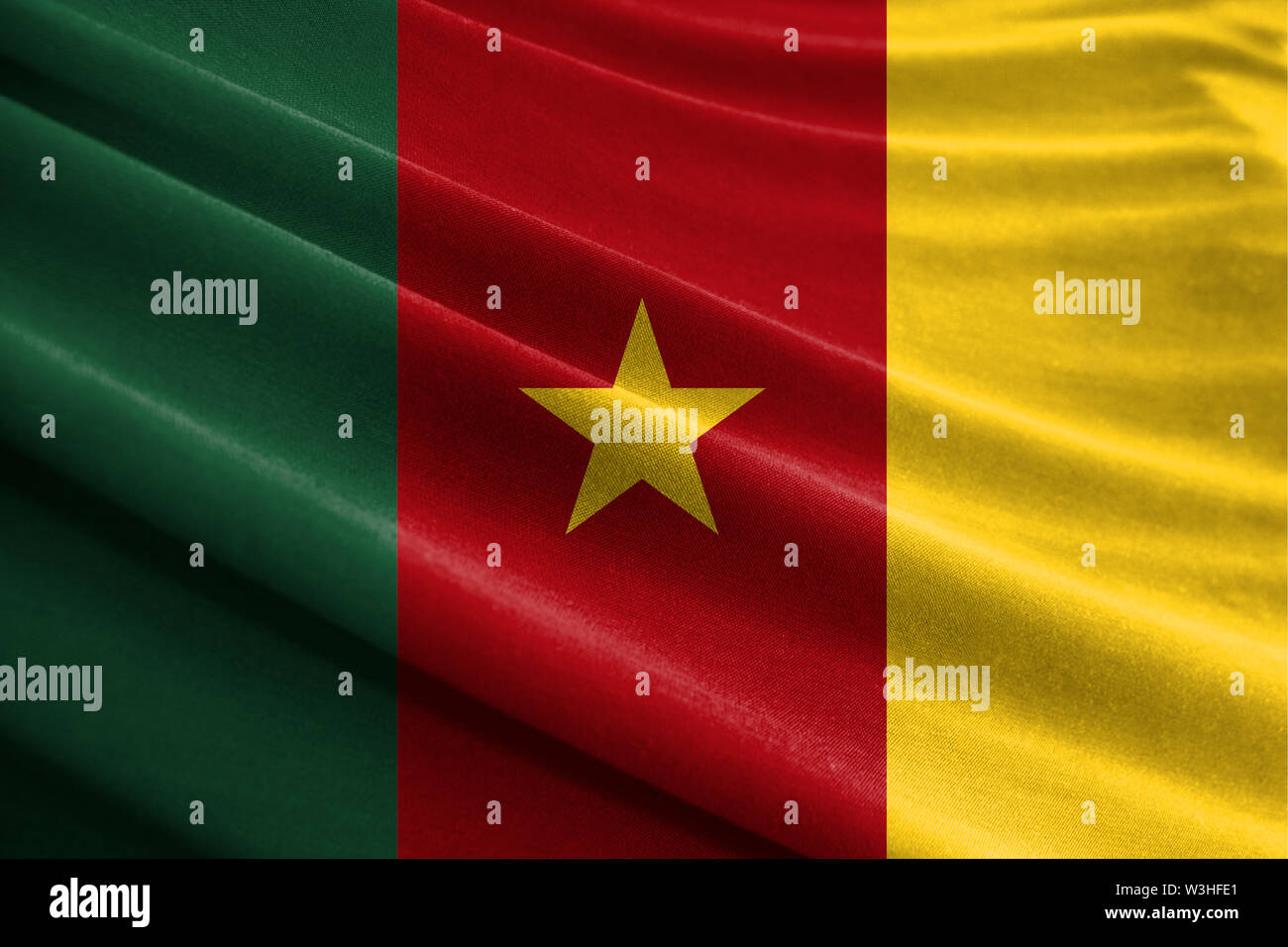 Realistic flag of Cameroon on the wavy surface of fabric Stock Photo ...