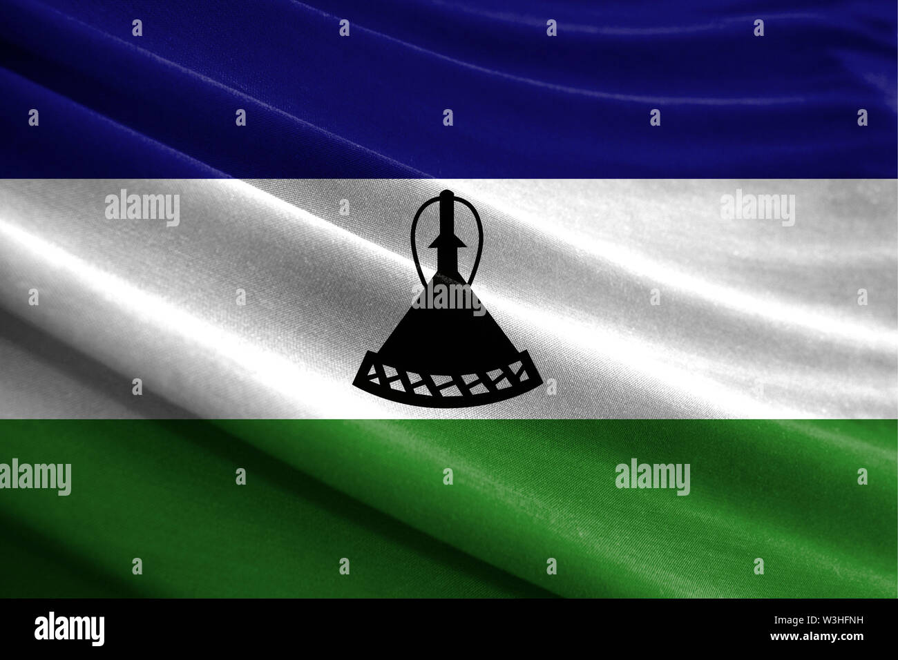 Realistic flag of Lesotho on the wavy surface of fabric Stock Photo - Alamy