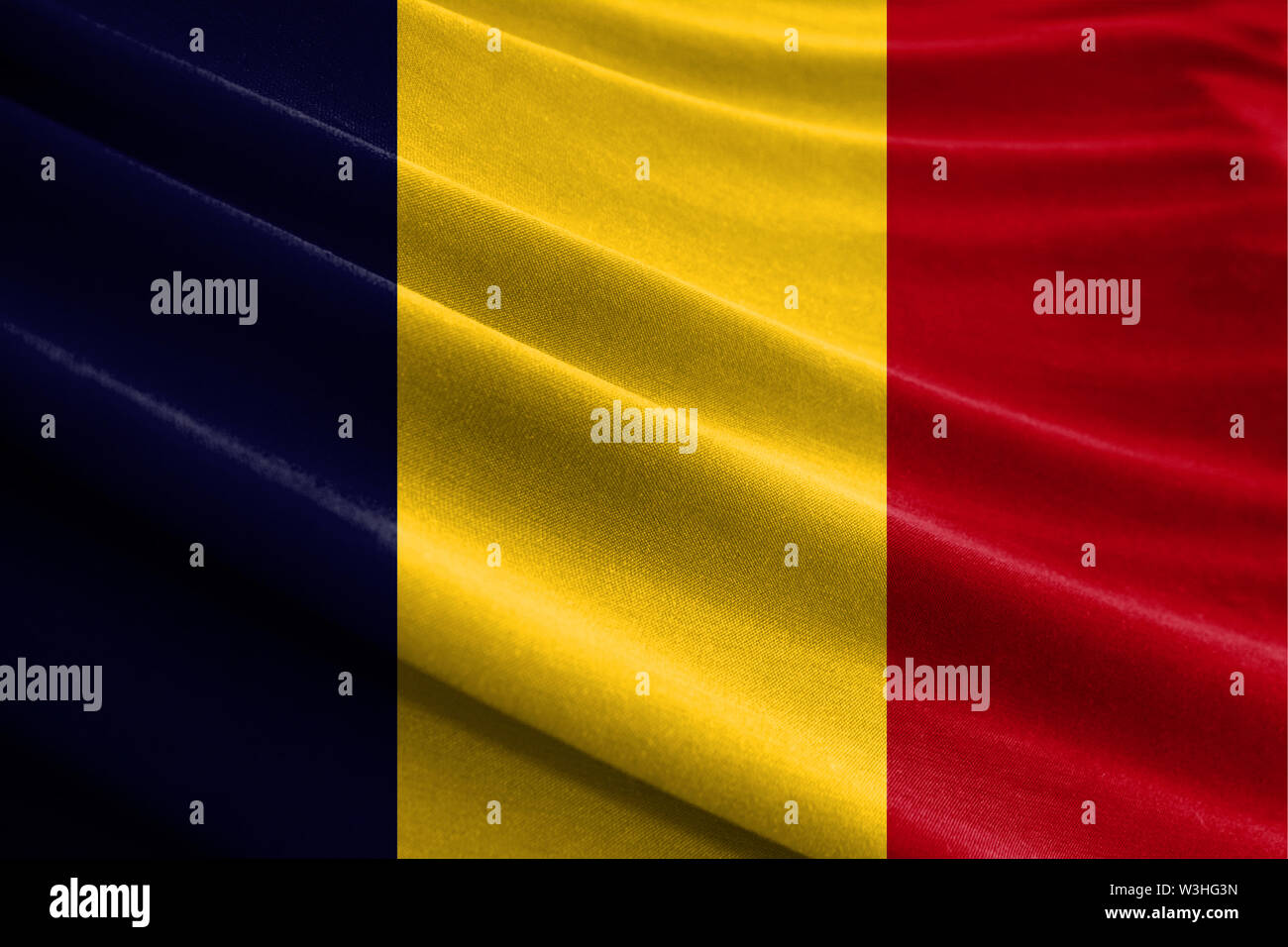 Realistic flag of Chad on the wavy surface of fabric Stock Photo - Alamy