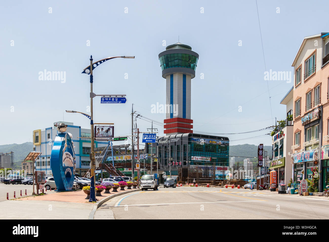 Street Scenario of Lighthouse Park with Building and Tower in Mukho ...
