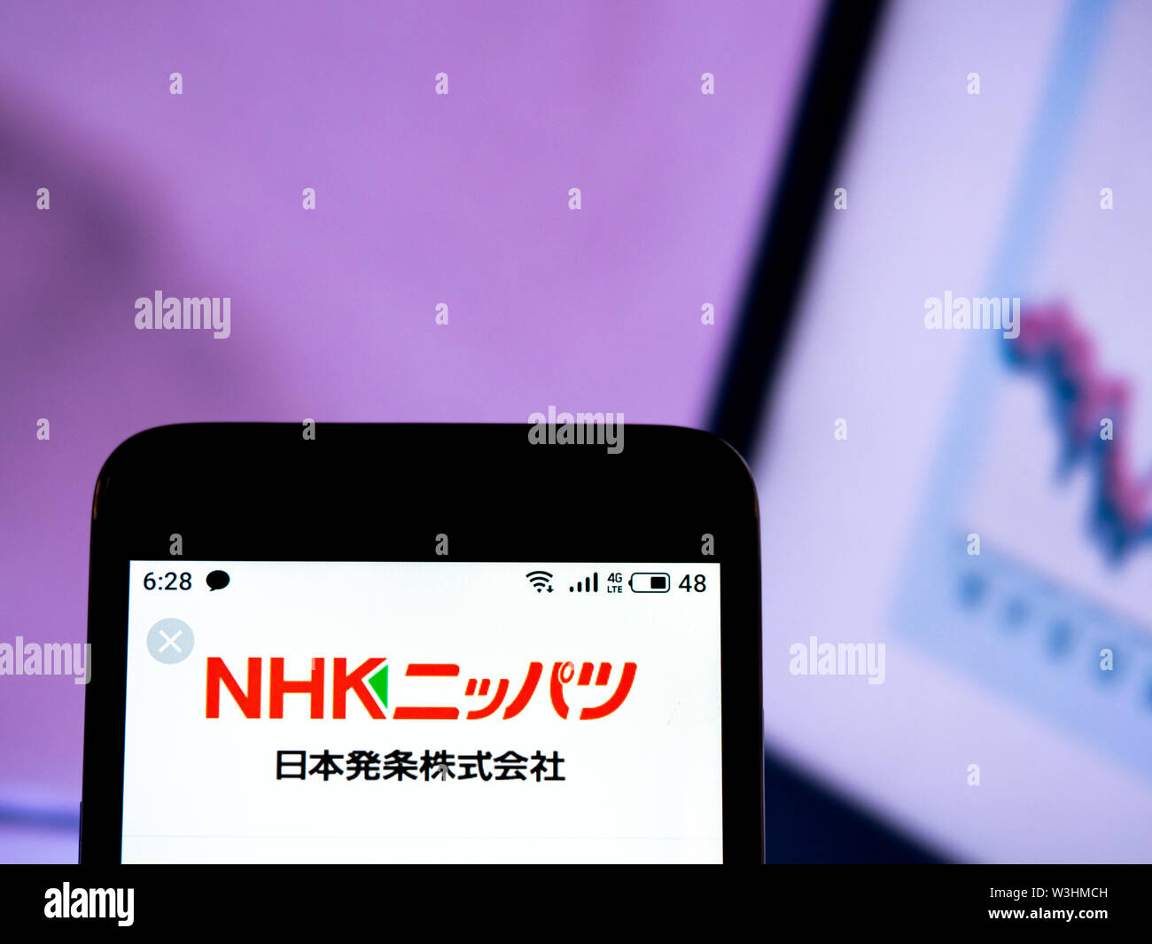 In this photo illustration the NHK Spring Co., Ltd. logo is seen ...