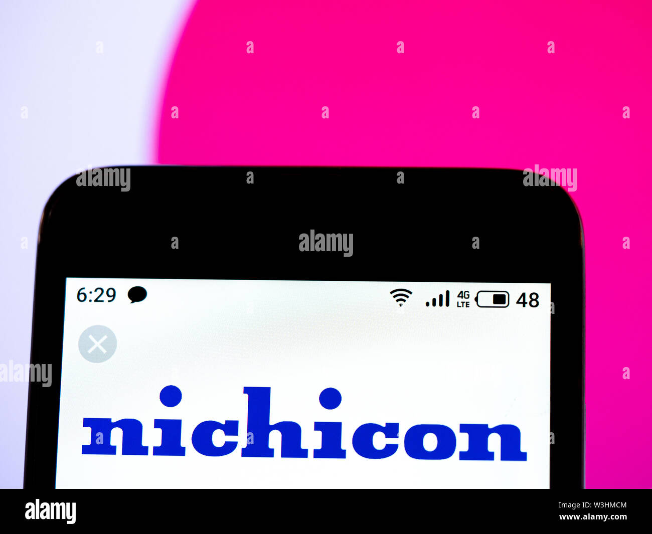 In this photo illustration the Nichicon Corporation logo is seen ...