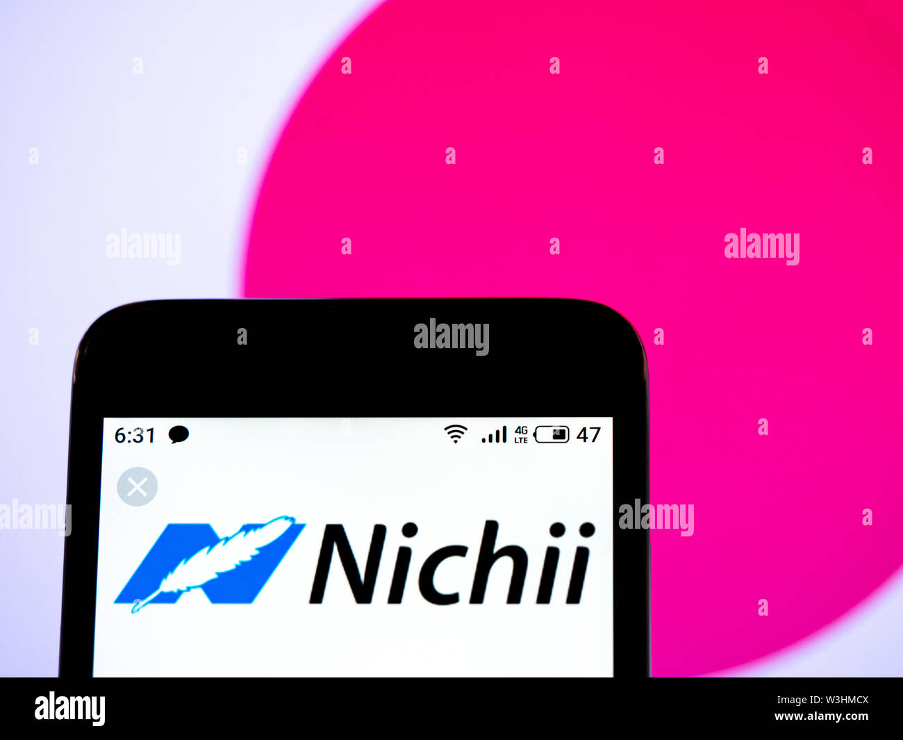 In this photo illustration the Nichii Gakkan logo is seen displayed on ...
