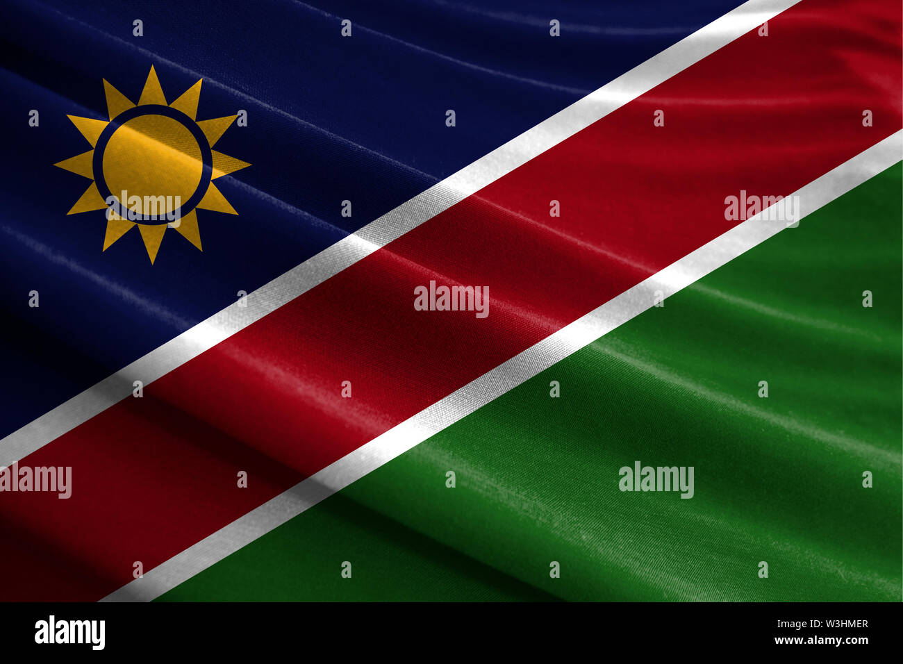 Realistic flag of Namibia on the wavy surface of fabric Stock Photo - Alamy