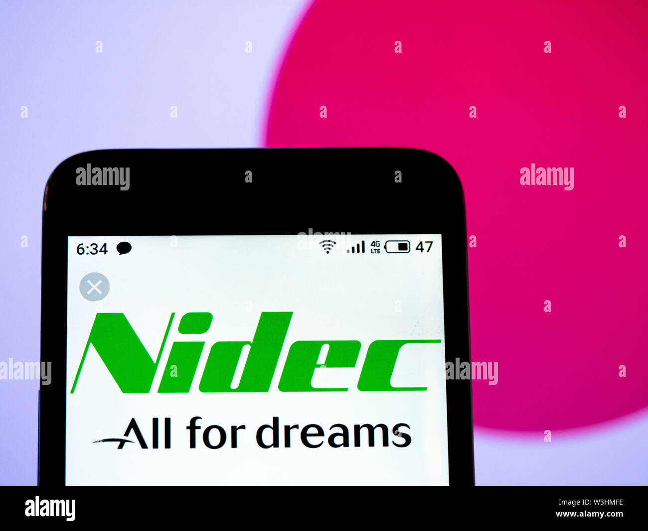 In this photo illustration the Nidec Corporation logo is seen displayed ...