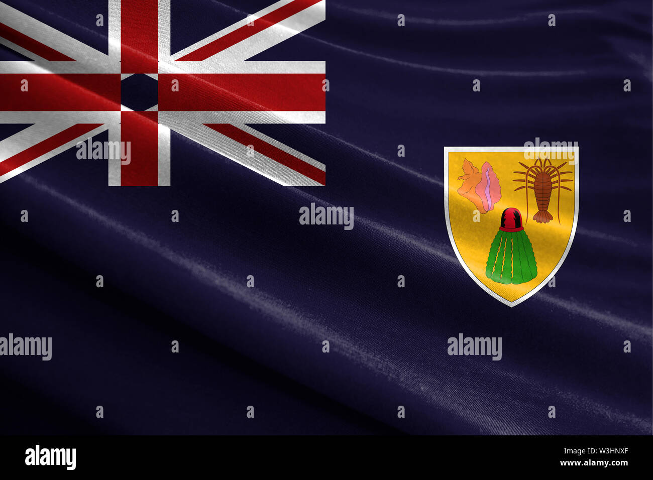 Realistic flag of Turks and Caicos Islands on the wavy surface of ...