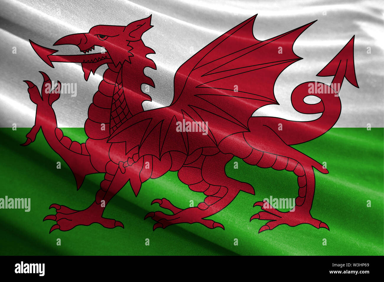 Realistic flag of Wales on the wavy surface of fabric Stock Photo - Alamy