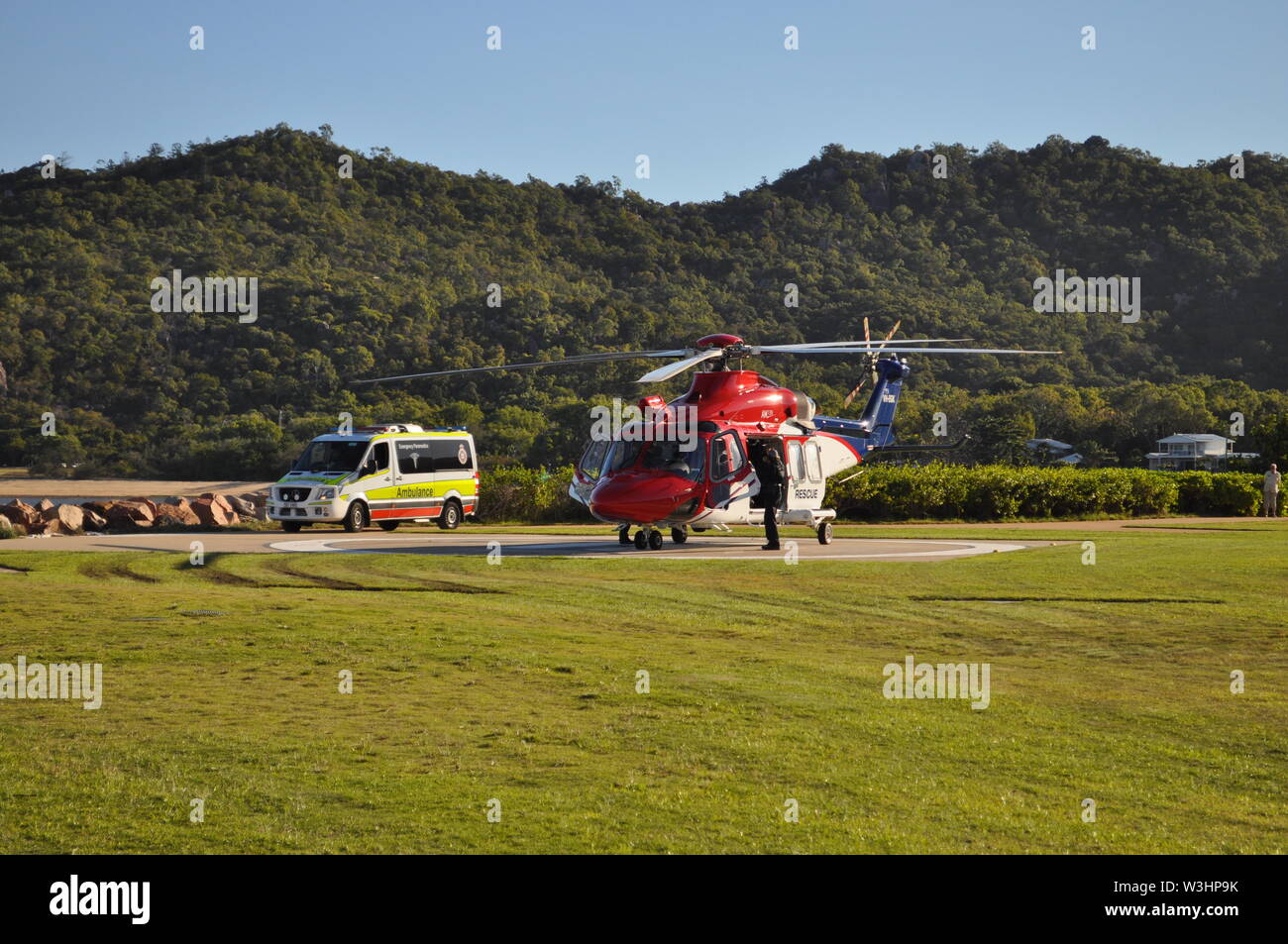 Rescue helicopter, in an emergency, collecting a patient from Nelly Bay ...