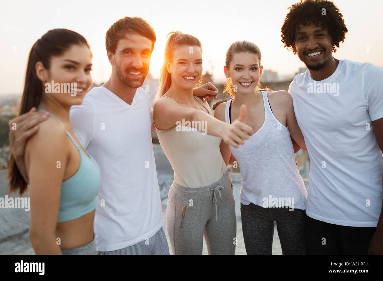 Fitness, sport, friendship and healthy lifestyle concept - group of ...