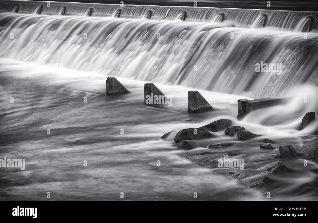 Long exposure beautiful shot of the Lech river dam in Reutte Stock ...