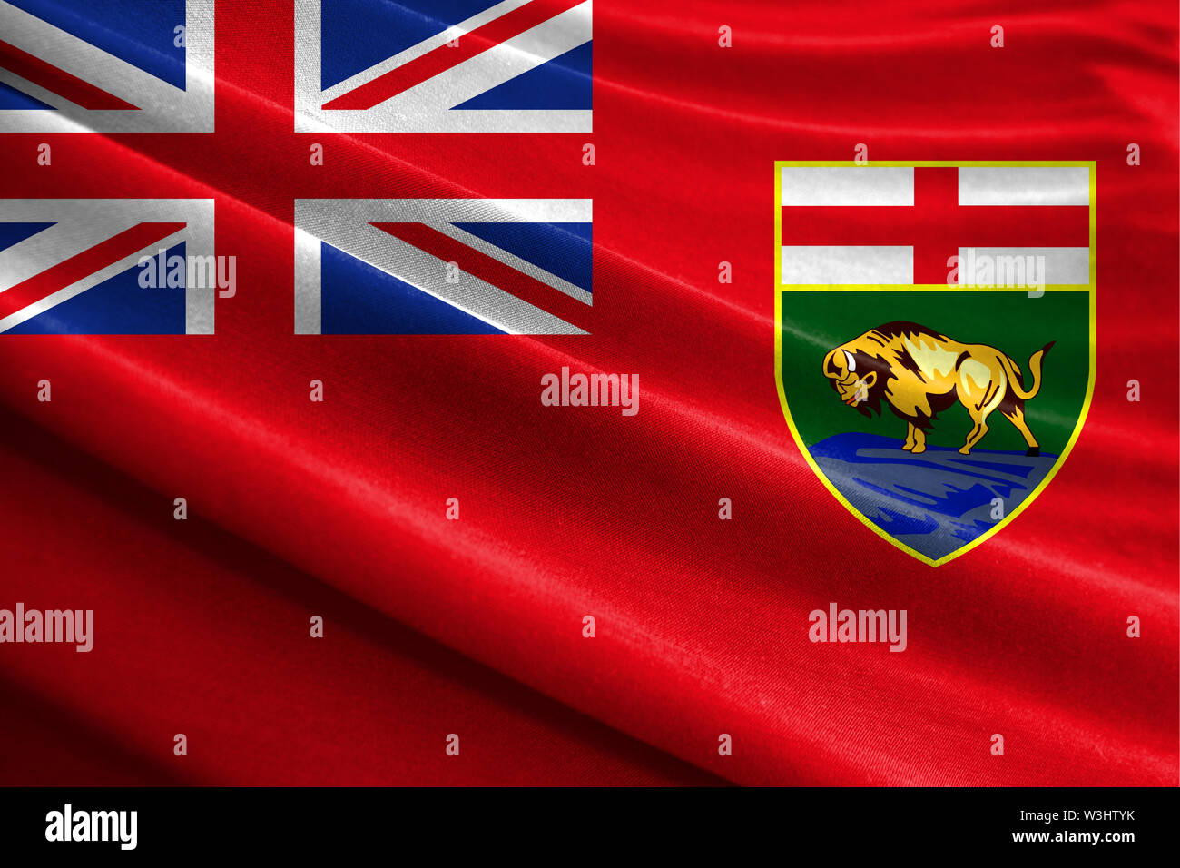 Realistic flag of Manitoba on the wavy surface of fabric Stock Photo ...