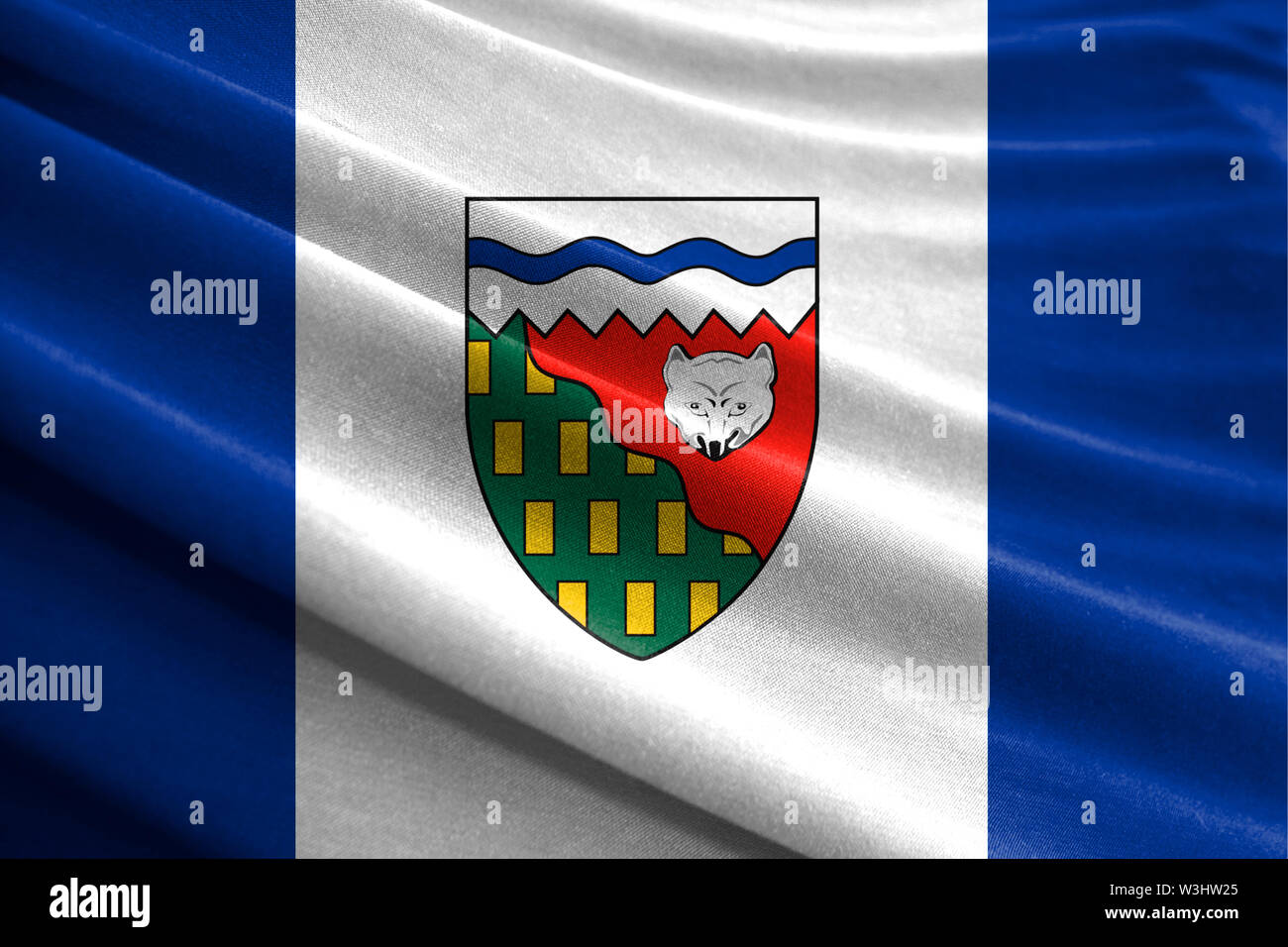 Realistic flag of Northwest Territories on the wavy surface of fabric ...