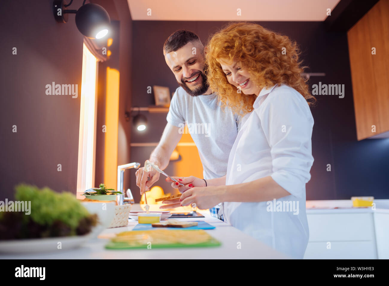 Preparing sandwiches hi-res stock photography and images - Alamy