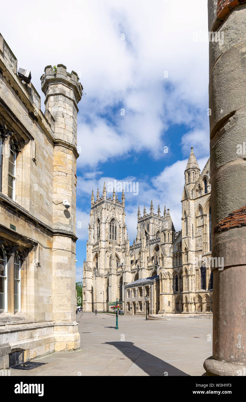 York Minster viewed from between an ancient Roman column and an old ...